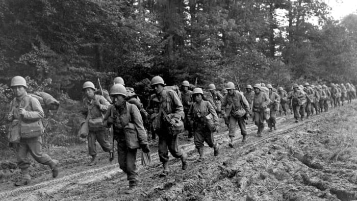 Japanese-American troops, part of the 442nd Infantry Regiment, marching ...