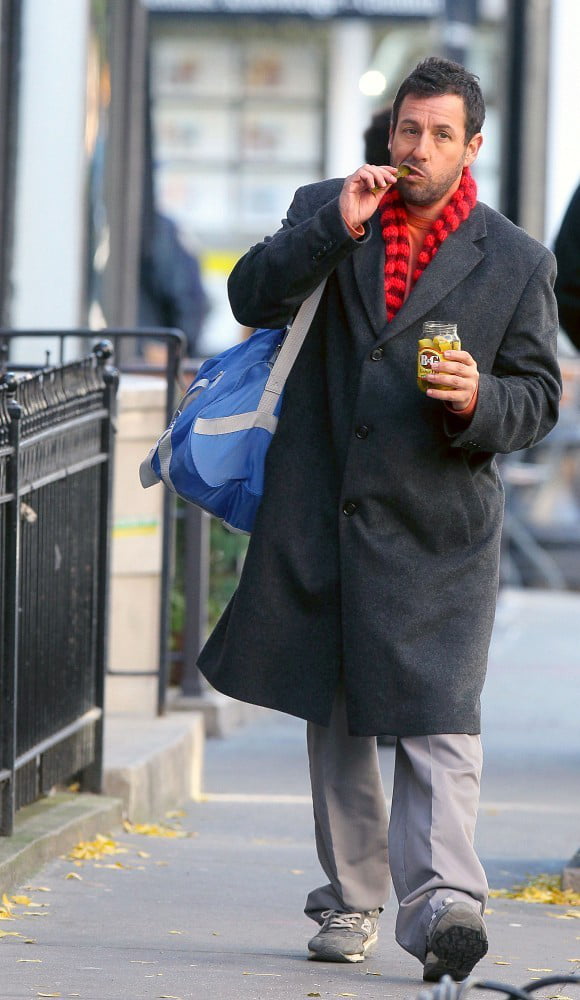 Adam Sandler walking around New York City eating a jar of pickles - 9GAG
