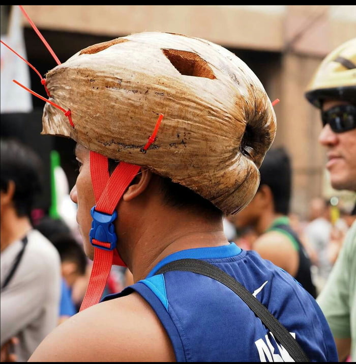 Coconut used as a makeshift helmet. - 9GAG