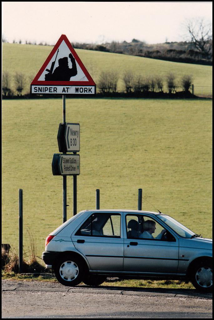A road sign warning the British Army, and local RUC of active IRA ...