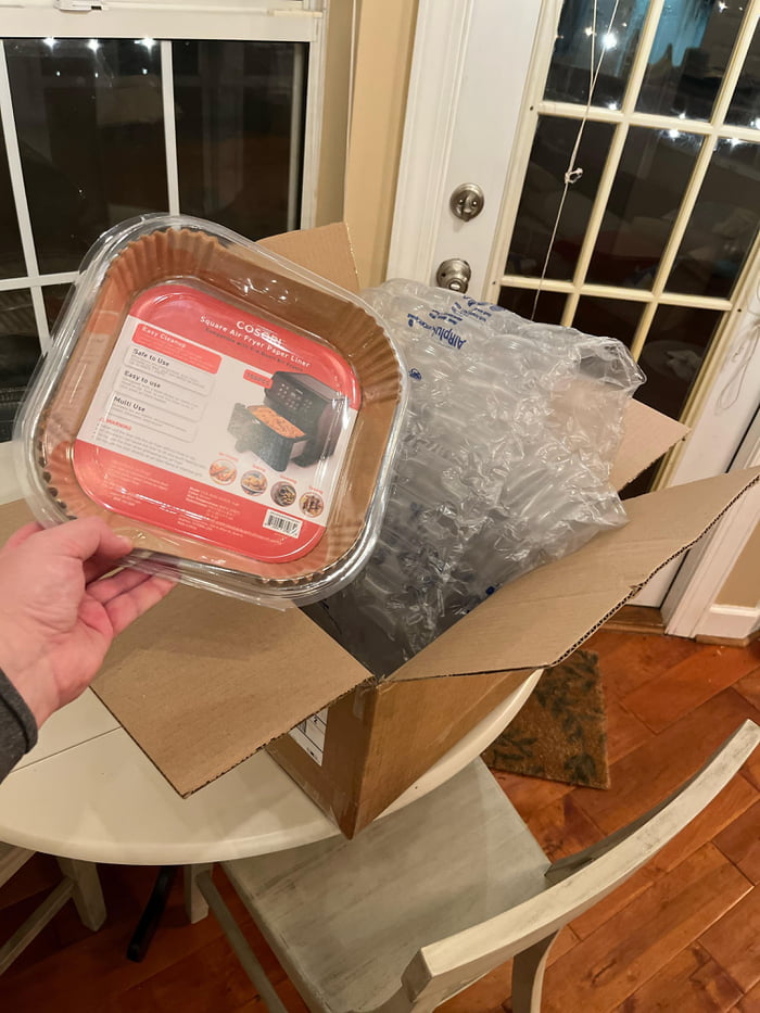 Absurd ass packaging for some air fryer liners. - 9GAG