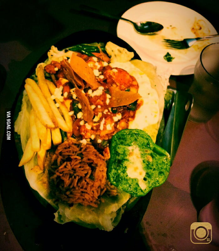 A classic chicken sizzler-French fries, marinated rice, capsicum ...