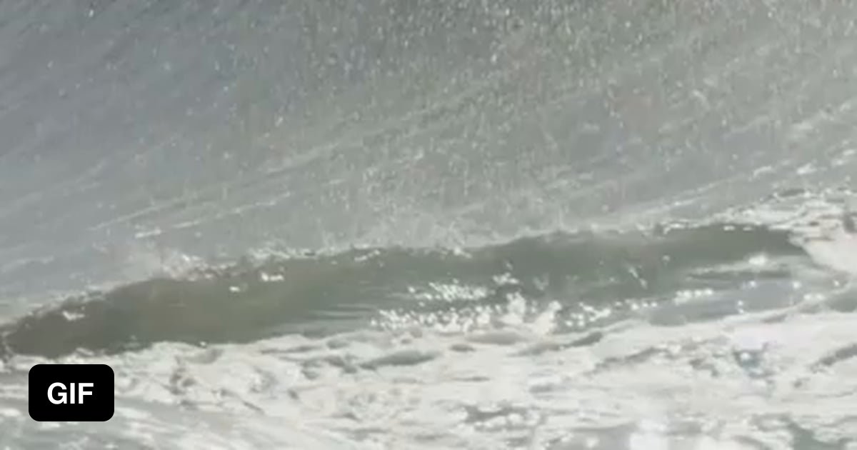 Professional surfer Mason Barnes, riding a wave in Nazare, Portugal - 9GAG