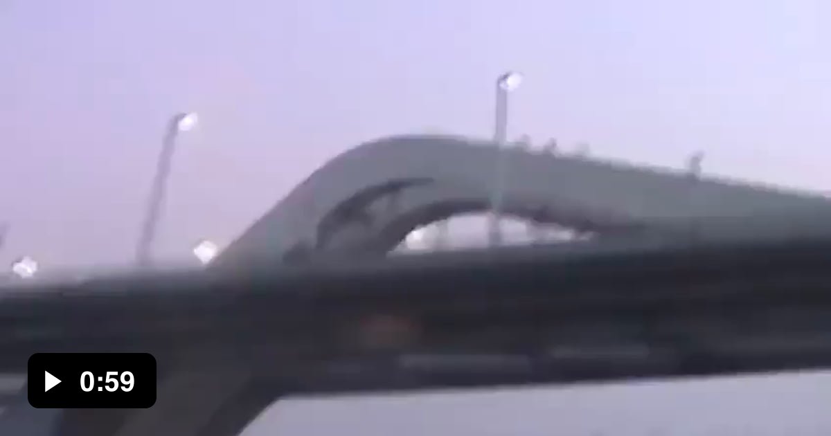 Man cycles down a bridge without any safety - 9GAG