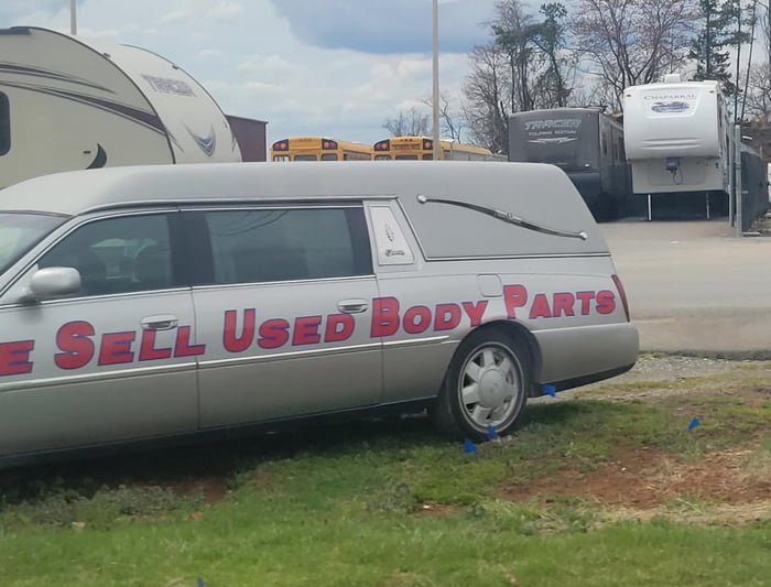 This says "we sell used body parts" it's a used car parts dealership ...