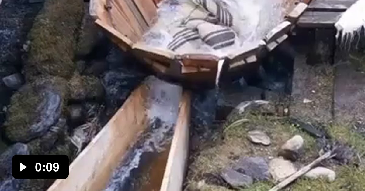 Traditional mechanism (vâltori) for washing clothes under running water ...