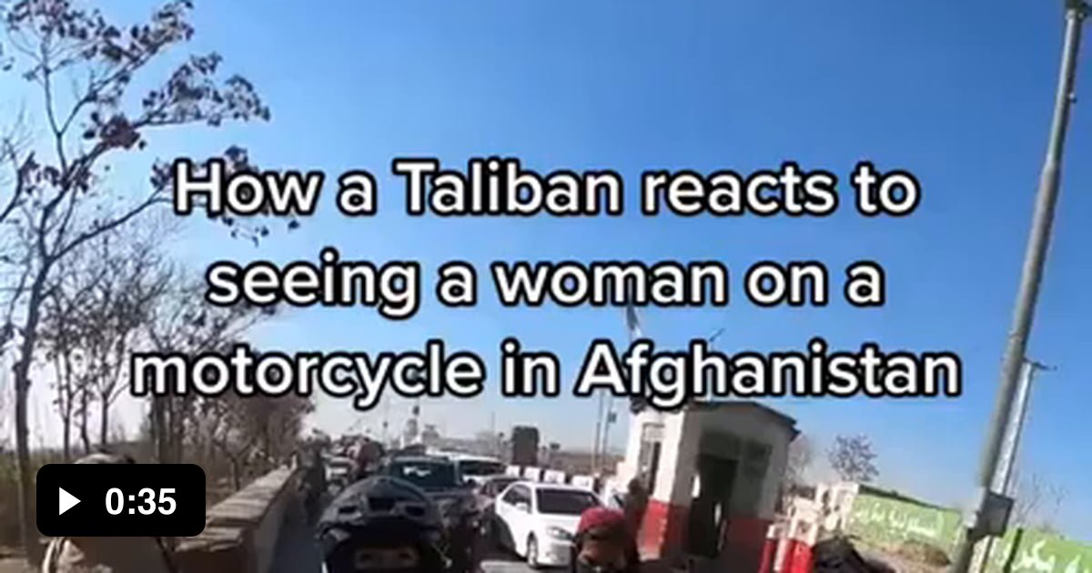 The Taliban can't believe this woman is riding a Motorcycle. - 9GAG
