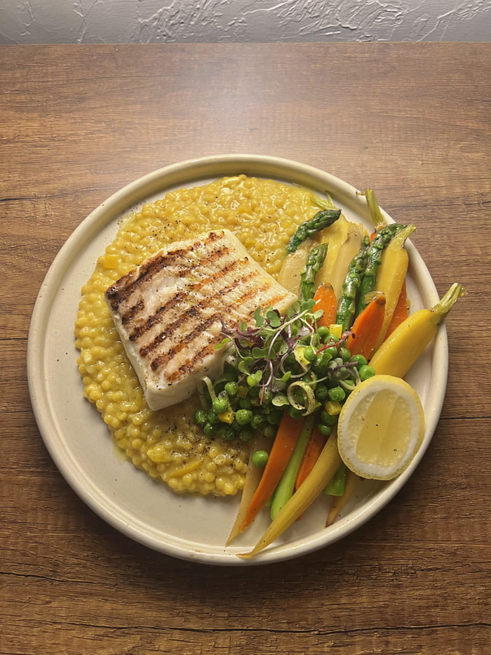 Grilled halibut, and spring vegetables w/ yellow curry cous cous ...