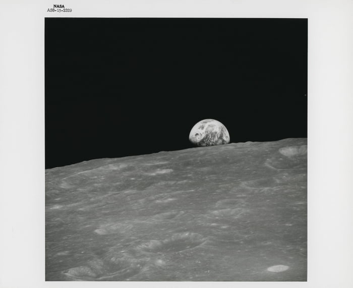 The first human-taken photograph of Earthrise by Apollo 8 crew member ...