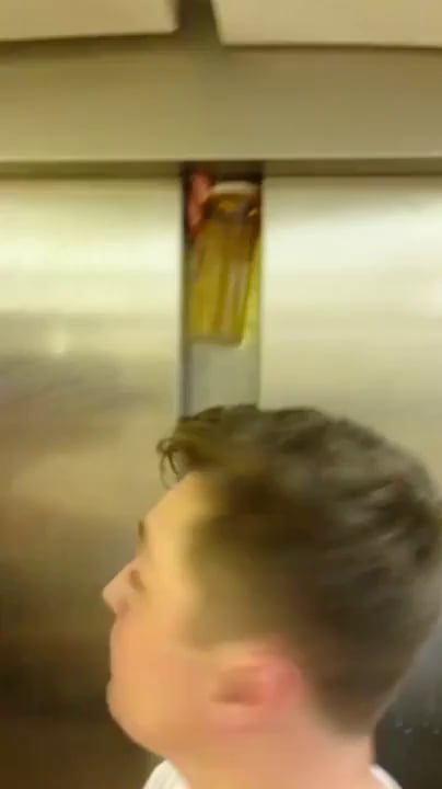 Hold your beer while we get you unstuck from the elevator... - 9GAG