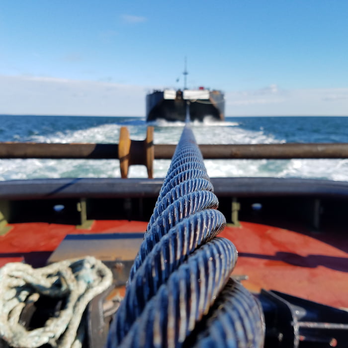 Towing a cargo ship. - 9GAG