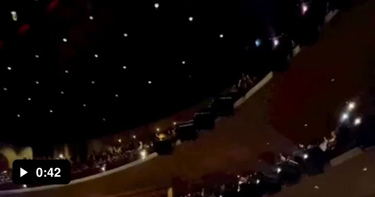 Adele signing the wedding dress of a bride who attended her concert right after getting married ...