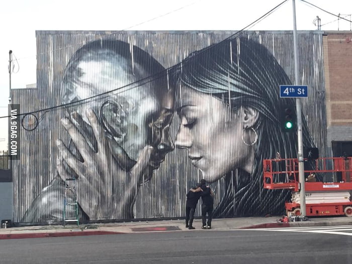 A tender moment between two street artists. - 9GAG