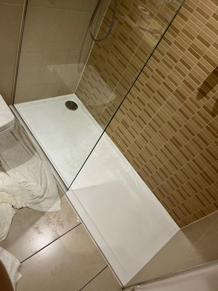 Who designed this fresh hell of a safety hazard?! Showered of 5-10 ...