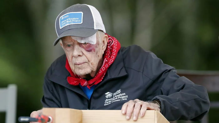 Former President Jimmy Carter, then 95 and having just suffered a fall ...