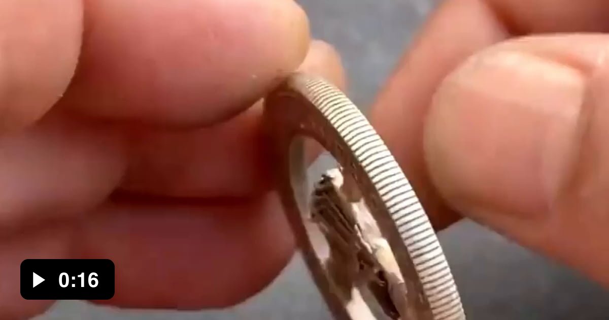 A redesigned coin to show a mechanical hand holding a sword. - 9GAG