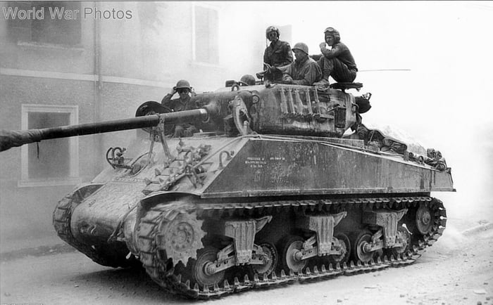 Italian Campaign. 25 April 1945. An M4A3(76)W Sherman of the US Army's ...