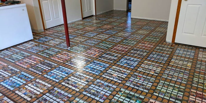 A floor made entirely from resin covered MTG cards. - 9GAG