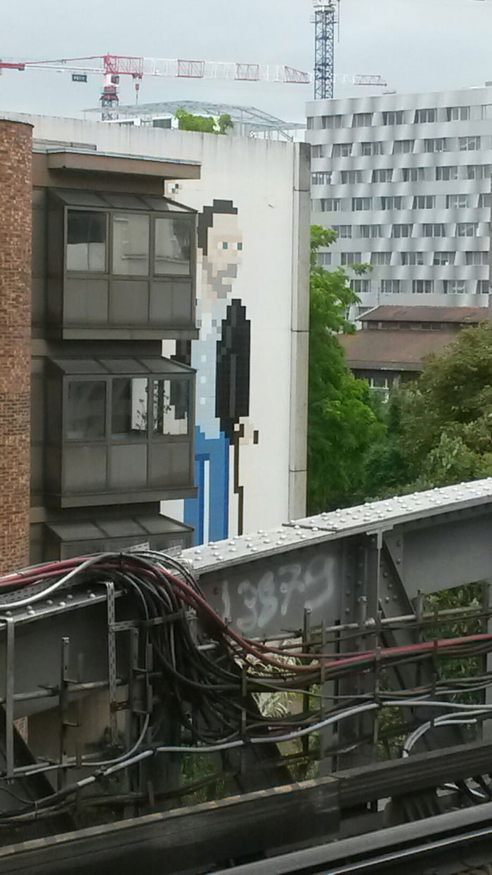 Giant dr house pixel art on a hospital's wall in Paris - 9GAG