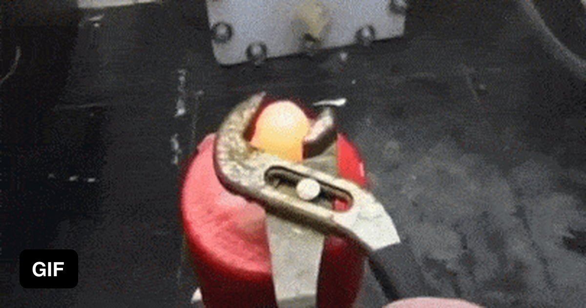 Red hot nickel ball placed on wax! - 9GAG