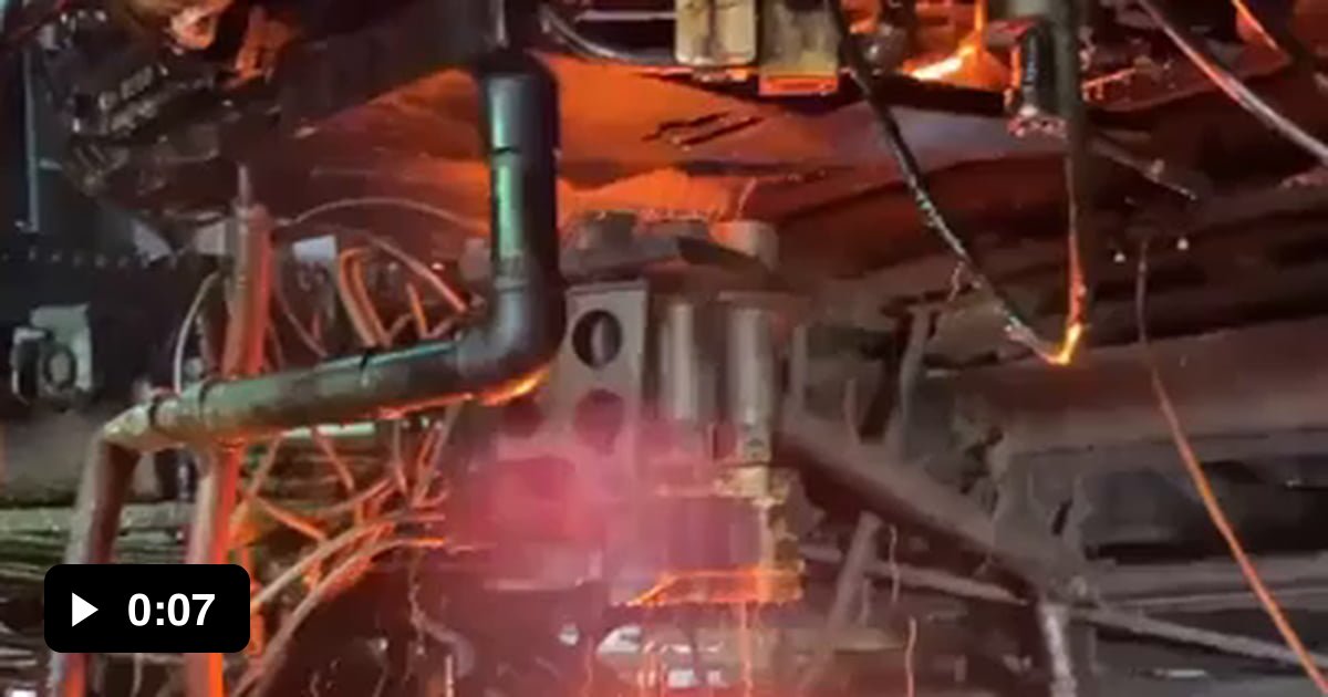 Each one of these red hot blobs are future glass bottles. The process ...