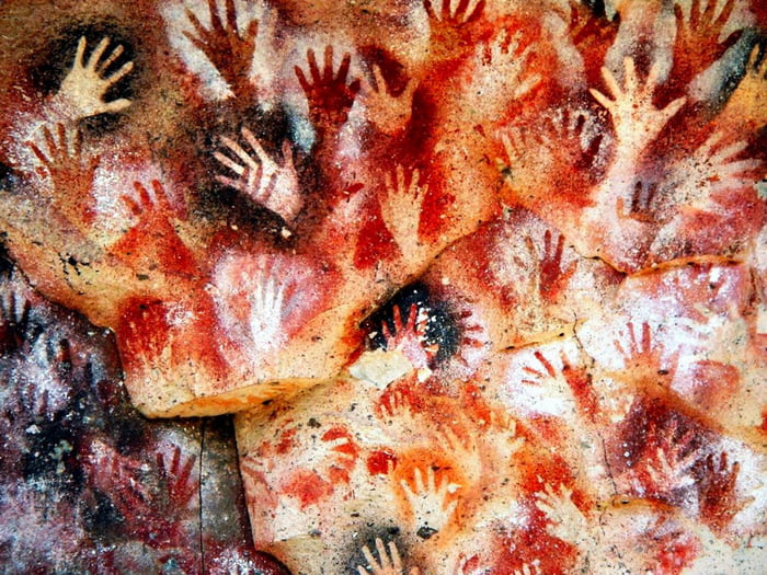 Cave of Hands, Argentina. The stenciled handprints and wall paintings ...