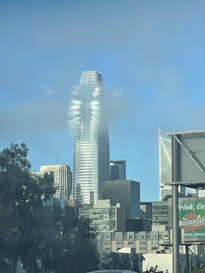 Cloud in SF this afternoon. Reflecting off the building - 9GAG