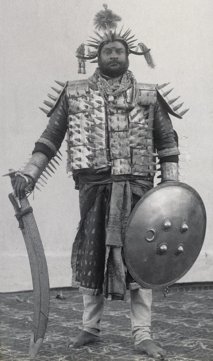 Photo of an Indian state executioner wearing spiked armor, with sword ...