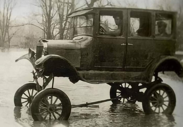 A Model-T Ford modified to drive through flood waters, 1926 - 9GAG