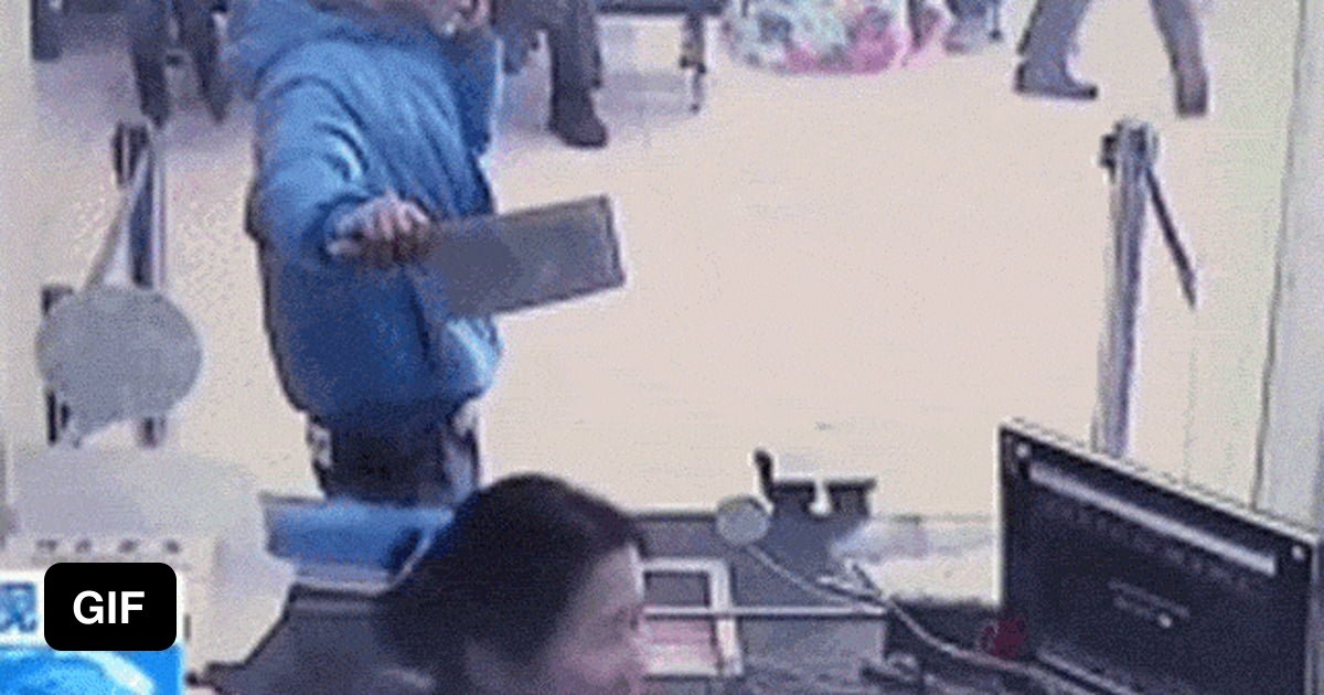 Teller LAUGHING at bank robber - 9GAG