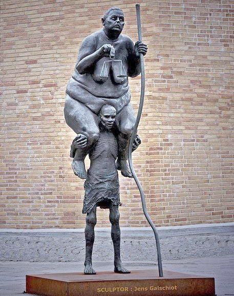Poor man carrying justice in his shoulders, by Jens Galschiot - 9GAG