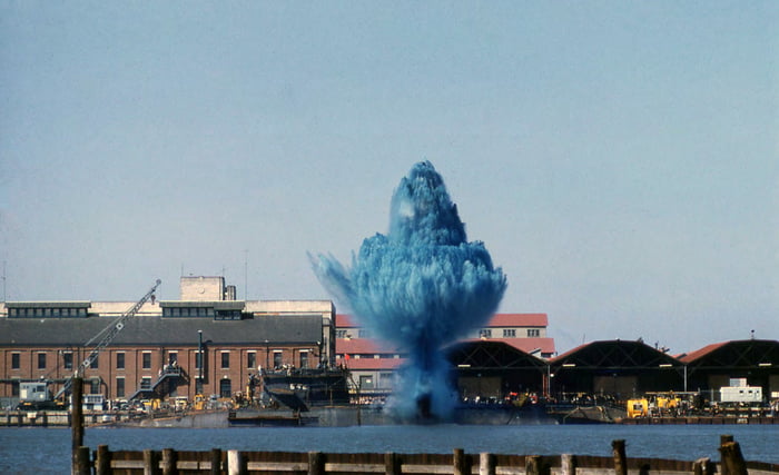 Ballistic missile submarine USS KAMEHAMEHA (SSBN 642) firing a blue ...