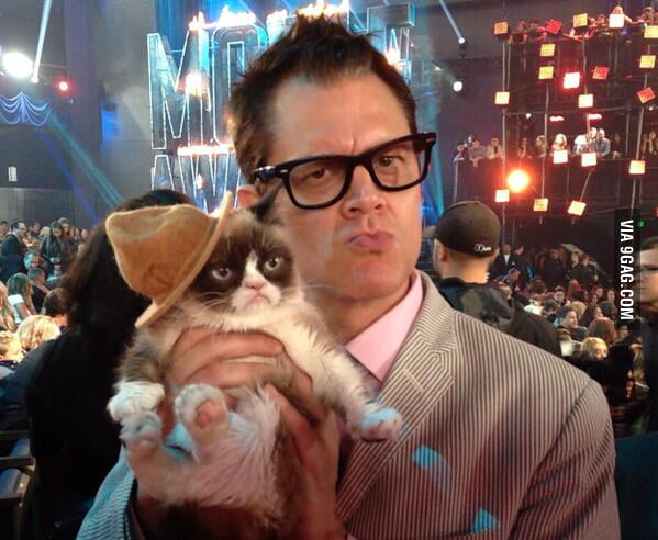 Epic photo: Johnny Knoxville and Grumpy Cat with Pharrell's hat. - 9GAG