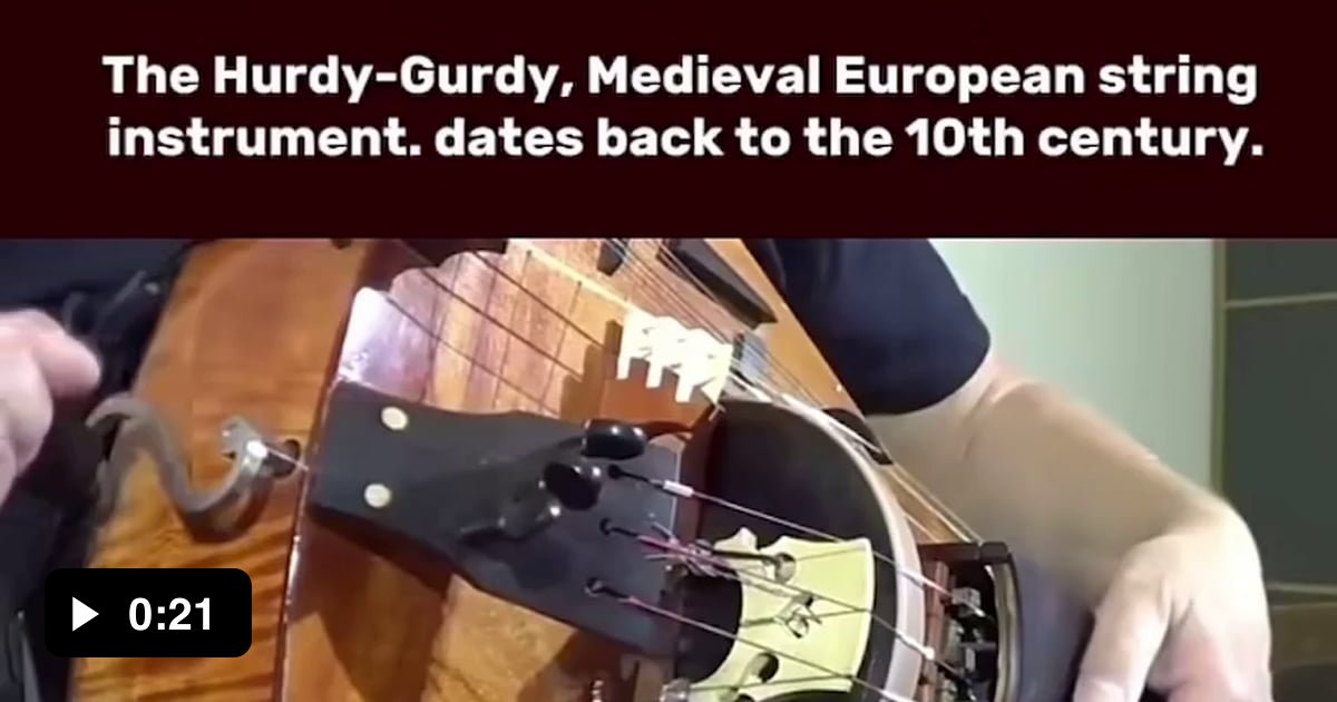 Hurdy-gurdy medieval string instrument that sings through a hand ...