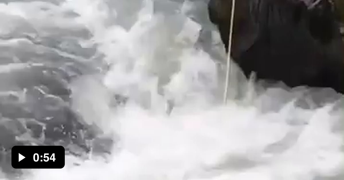 This guy jumping into a raging torrent to save a stranger from dying - 9GAG