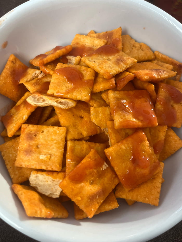 Extra crunchy chees its with franks red hot. Delicious - 9GAG