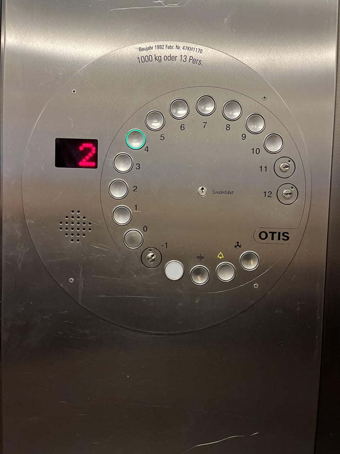 Elevator buttons in the shape of a crescent moon. - 9GAG