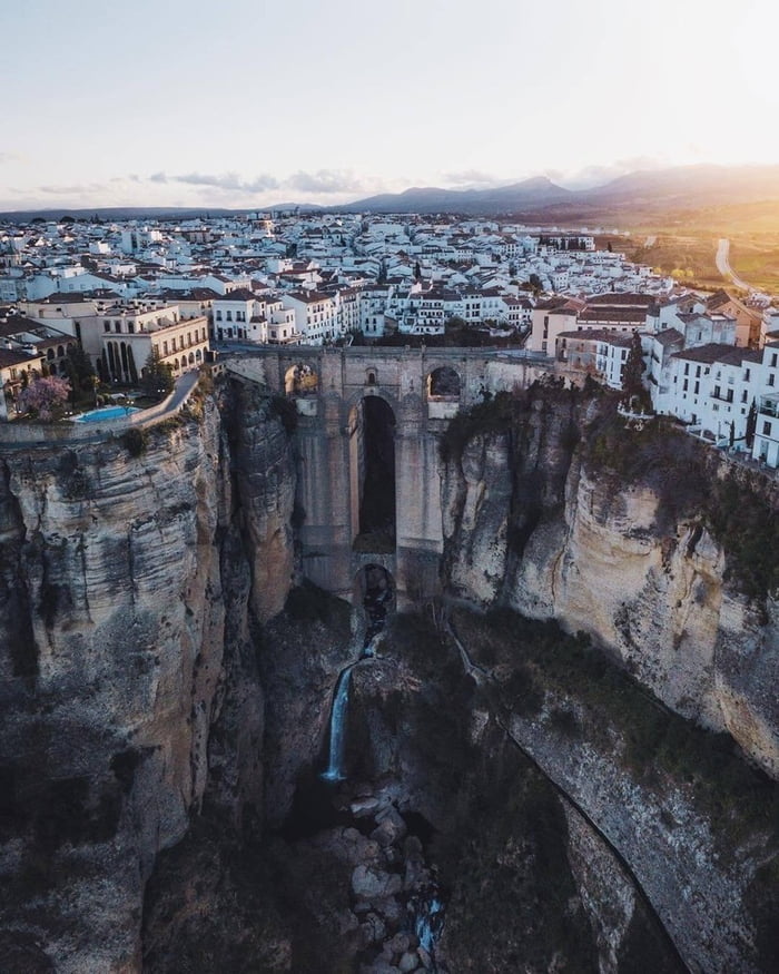 The city of Ronda, Spain. Located on top of a mountain above the 100 ...