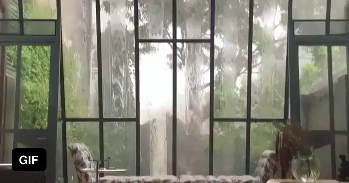 The way the rain flows off this building - 9GAG