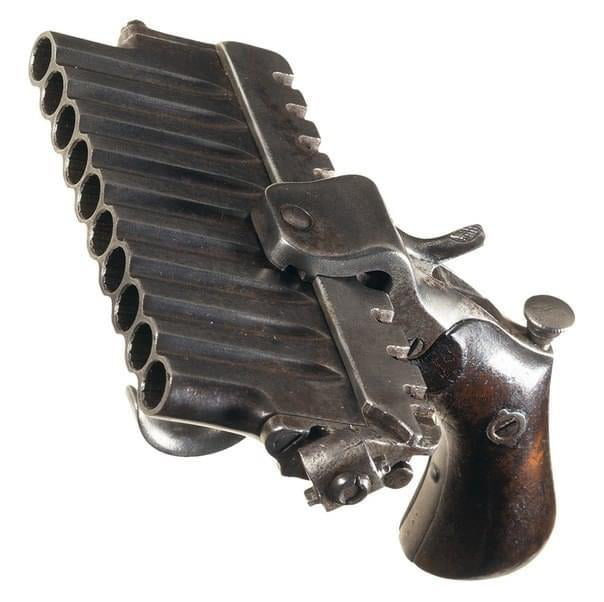 This French 10-shot harmonica pistol from the 19th-century. The button ...