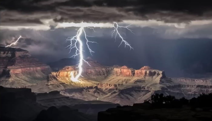 The Grand Canyon lit up by a lightning strike - 9GAG