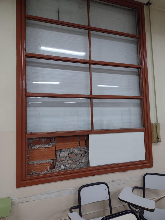 Useless window (there is a wall behind it) - 9GAG