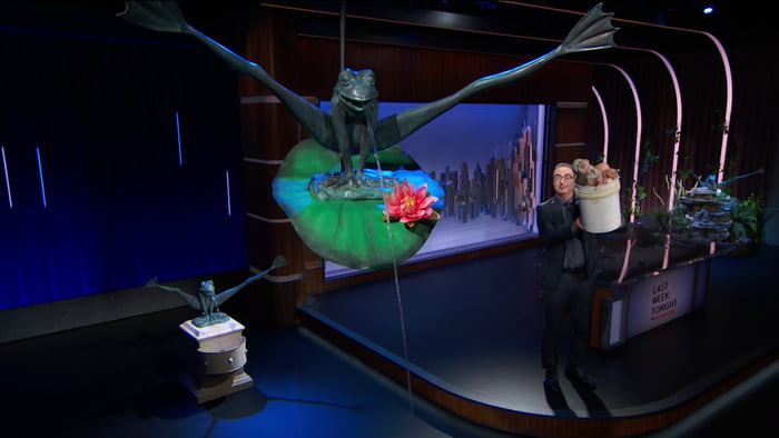 Three frog statues and John Oliver - 9GAG