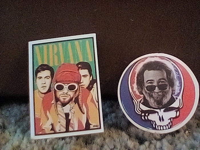 Here was two collectible stickers of two famous Rock Groups one was ...