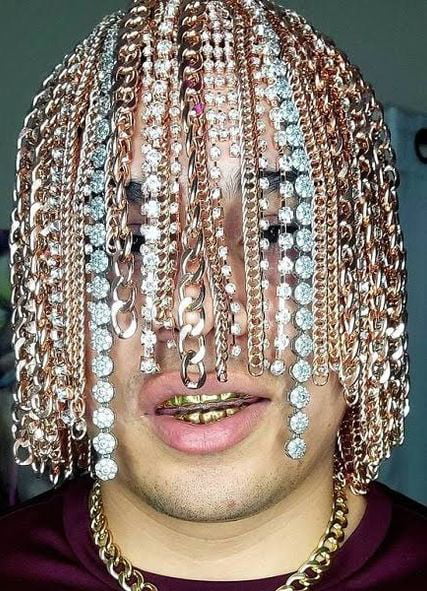 This rapper underwent surgery to replace his hair with gold chains. - 9GAG