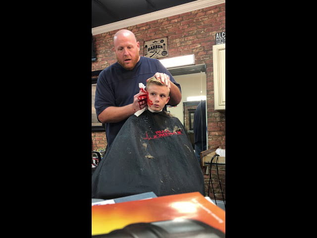 Awesome prank! Barber pranks kid by pretending he's cut his ear off. - 9GAG