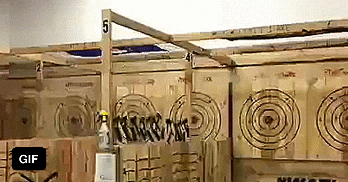Guy throwing axes at a target - 9GAG