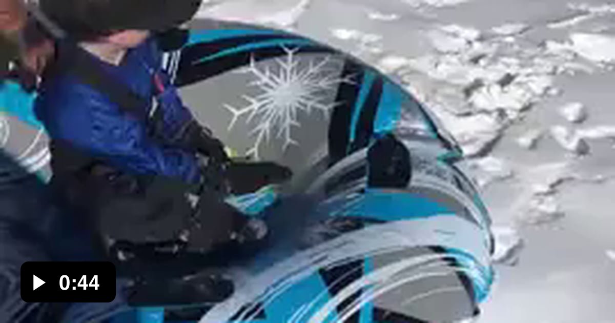 Kid gets on a snow tube and slides into infinity - 9GAG
