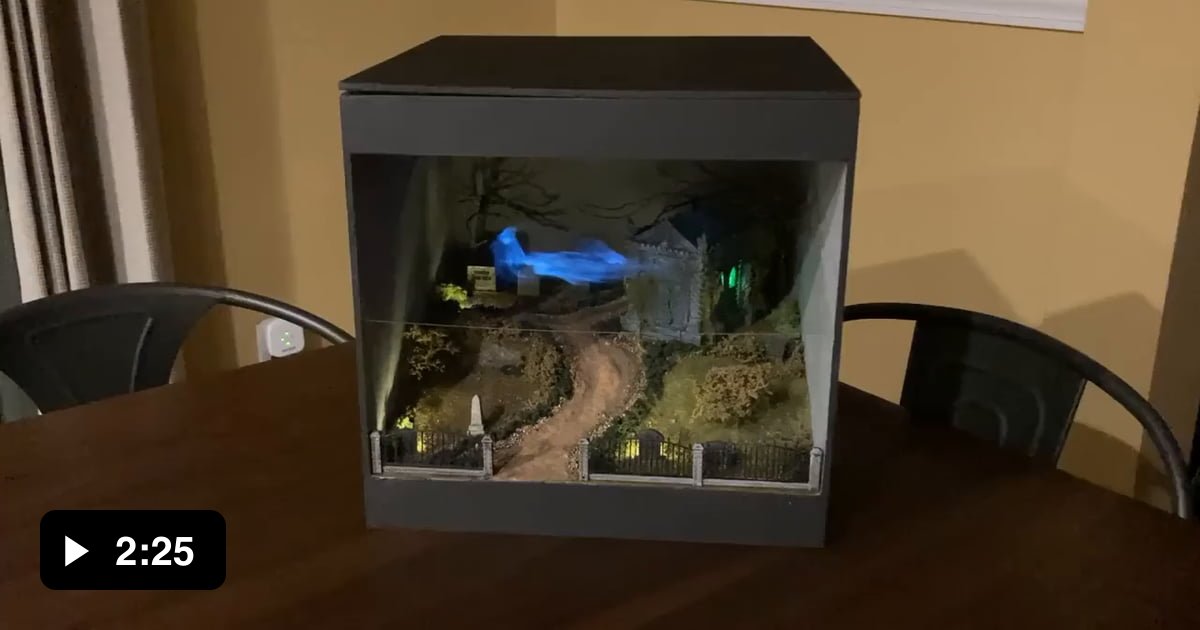 Graveyard diorama with flying ghosts (live effect, in-camera) - 9GAG