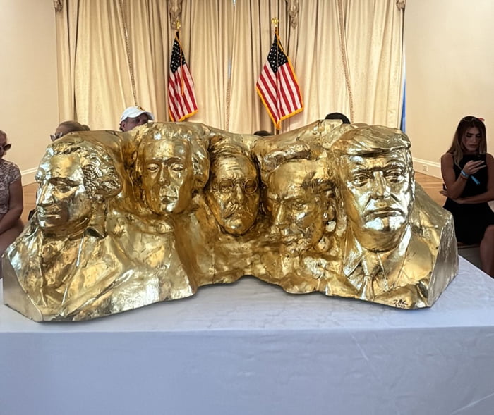A golden Mount Rushmore monument with Trump's head on display at Mar-a ...